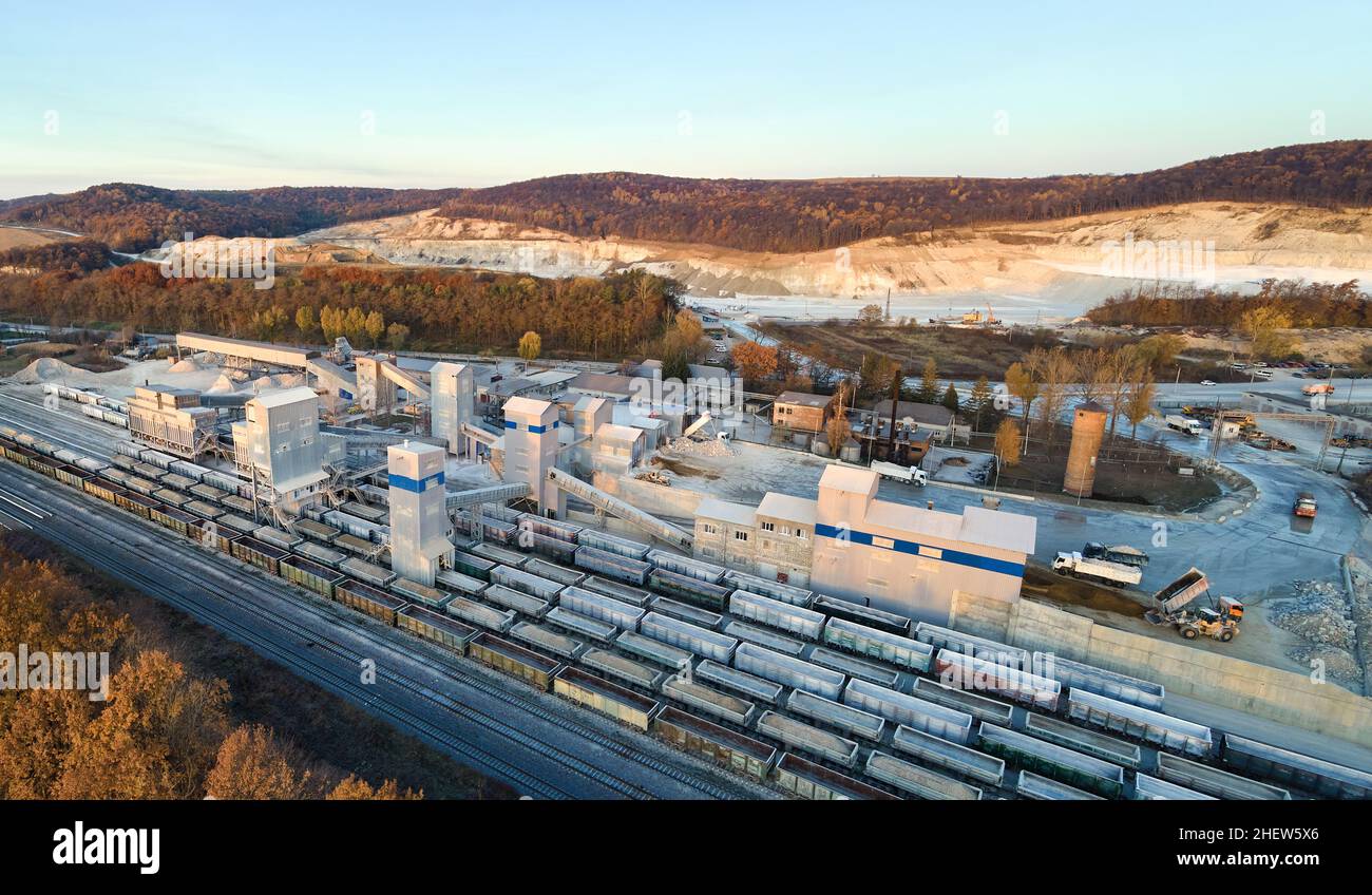 Aerial view of cargo train loaded with crushed stone materials at ...