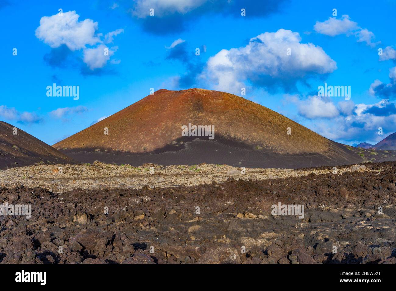 volcanic landscape under the extincted vulcano in Timanfaya national ...