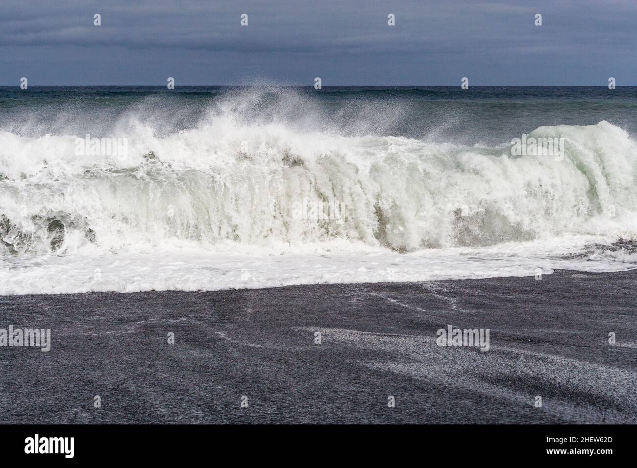 heavy waves with white wave crest in storm at the beach Stock Photo - Alamy