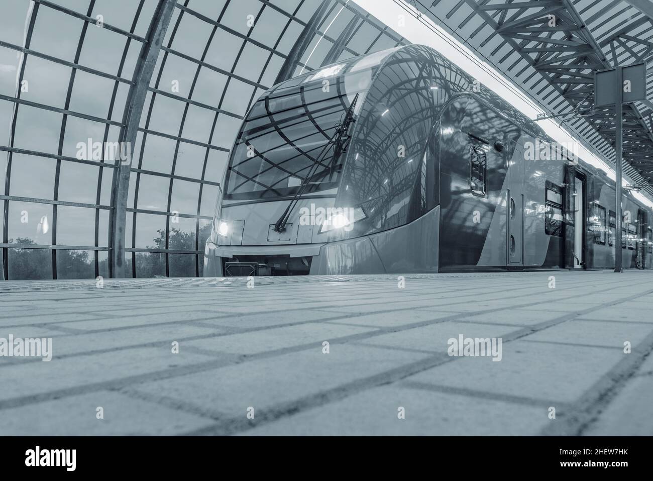 Train stands by the platform of Business Center station Stock Photo - Alamy