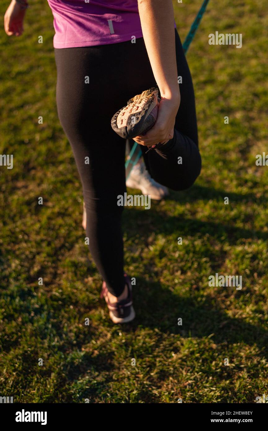 closeup stretching on the grass before and after training Stock Photo ...