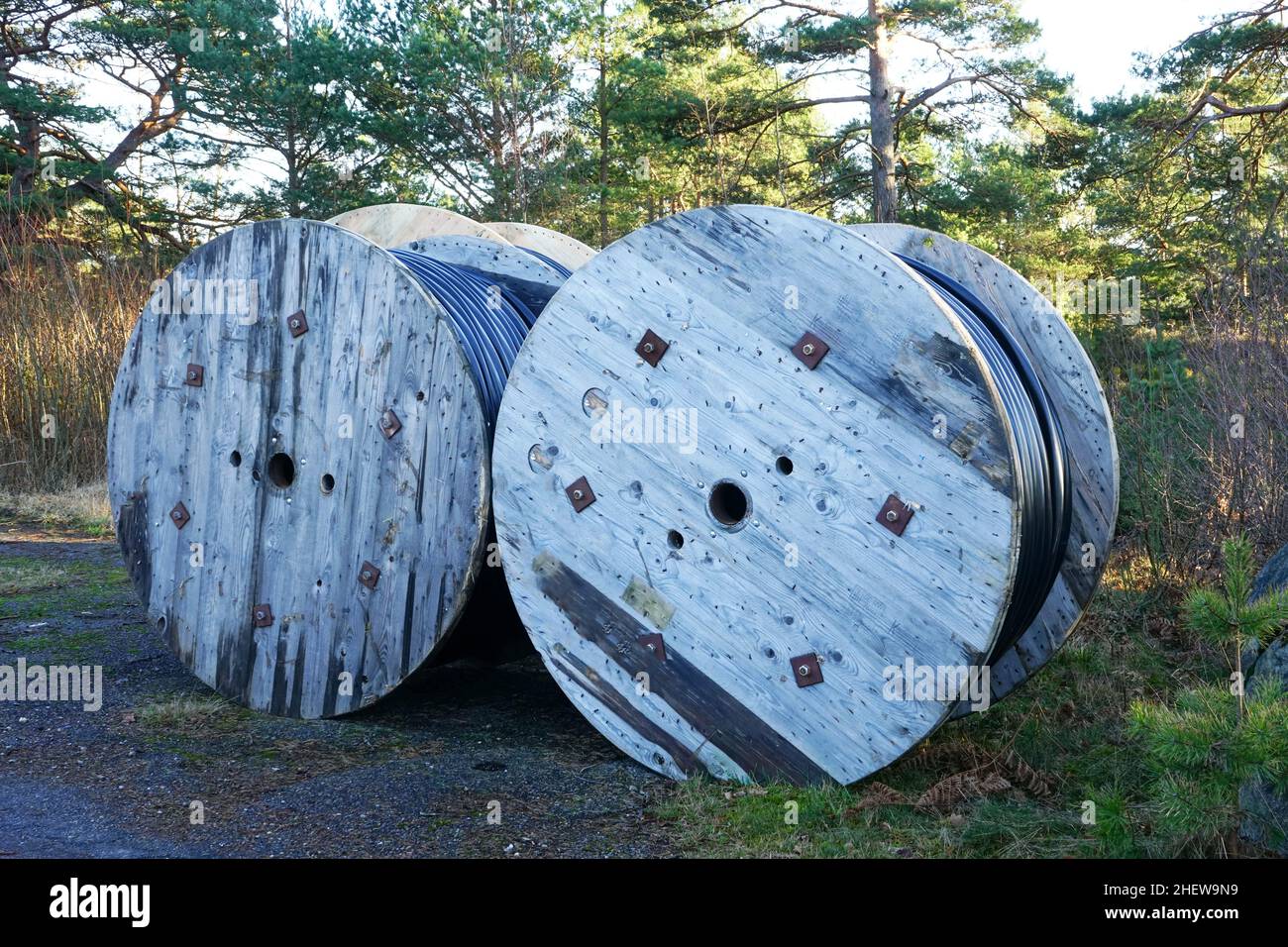 Large Wooden Reels of Coiled Cable Outdoor Stock Photo - Alamy