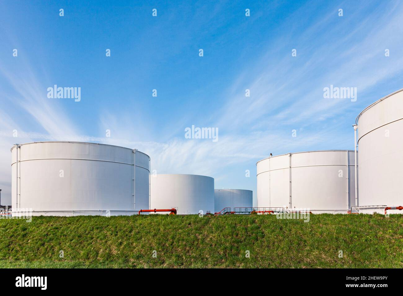 white tanks for petrol and oil in tank farm with blue sky Stock Photo ...