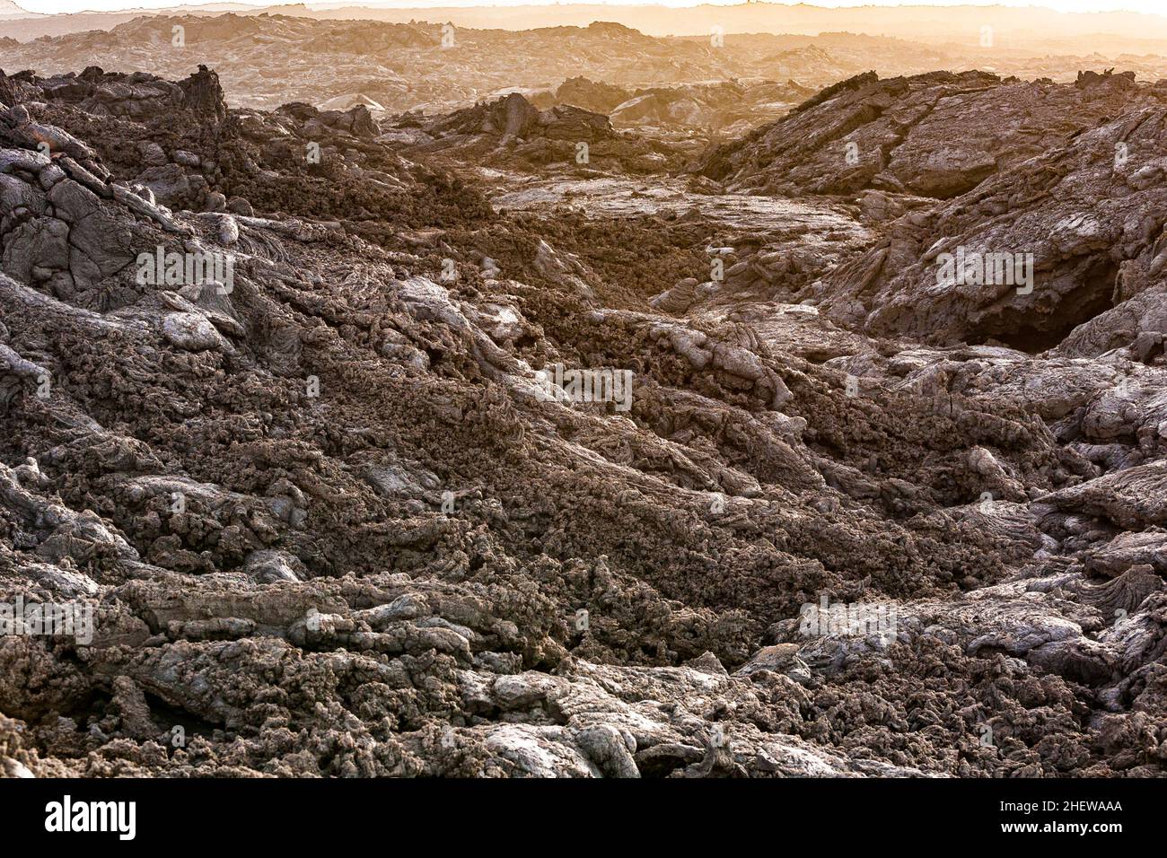Stones of volcanic flow give a beautiful natural structure Stock Photo ...