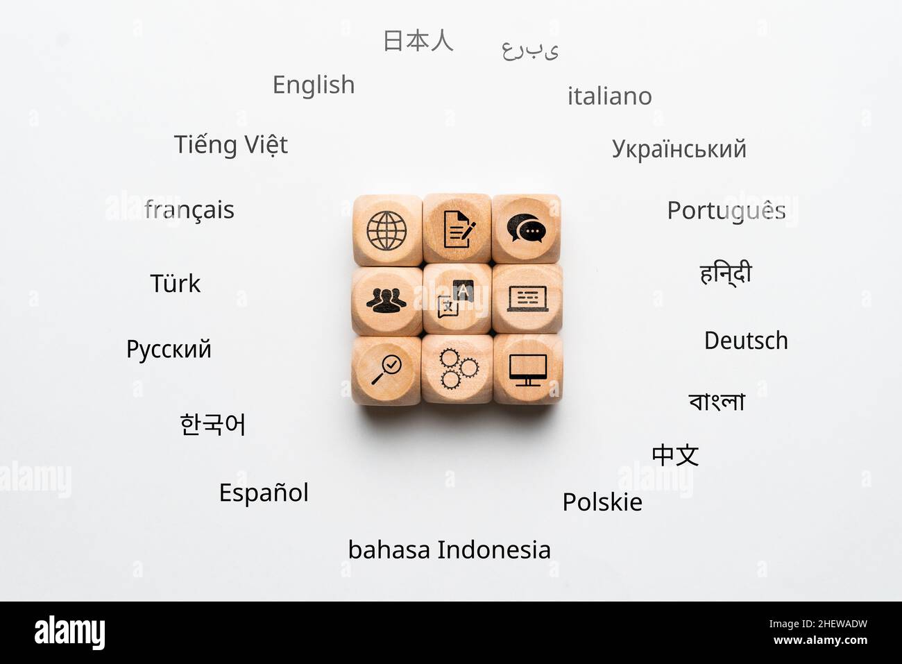 Translation concept. Different languages around wooden blocks with ...