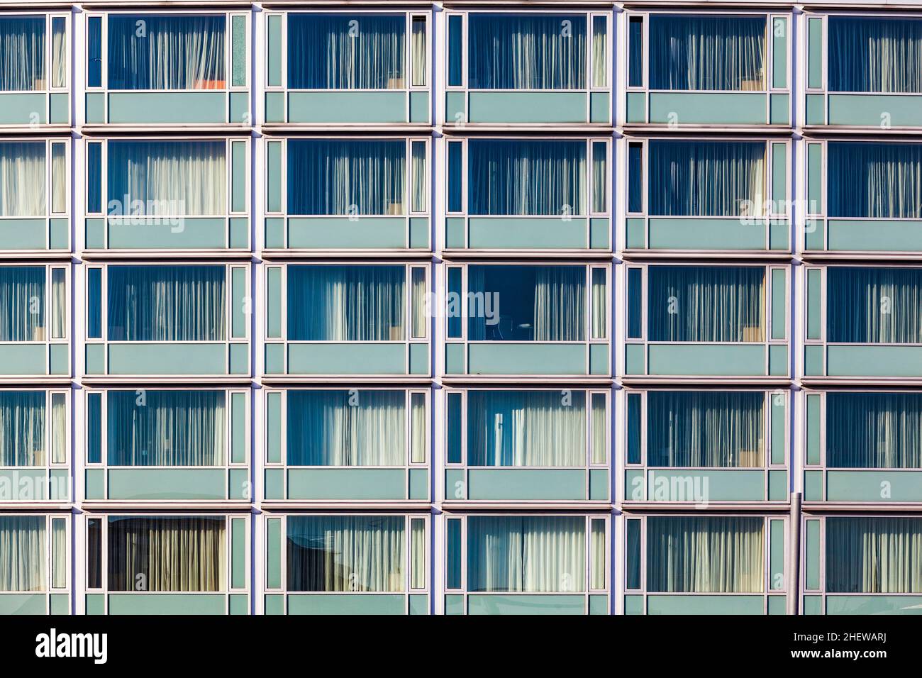 generic facade of building with curtains in style of the 60s Stock ...