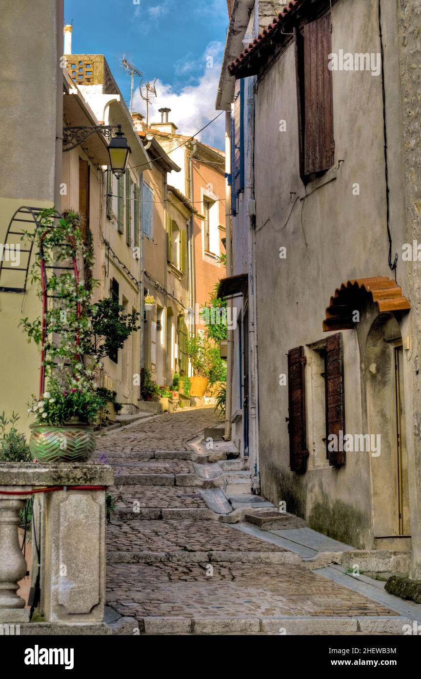 Beautiful sun lite alley way in Provence Stock Photo - Alamy