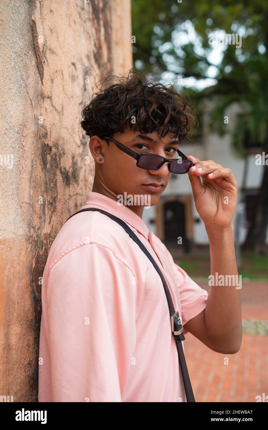 Portrait of an attractive and stylish fashionable young Latin American ...