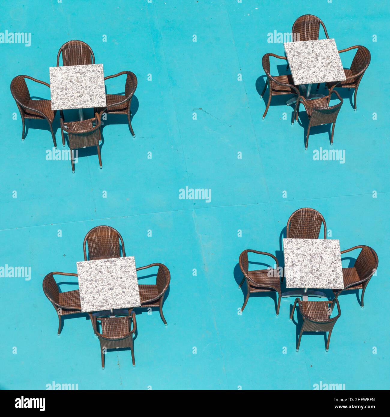 aerial of empty tables at a cruise deck with blue background Stock ...