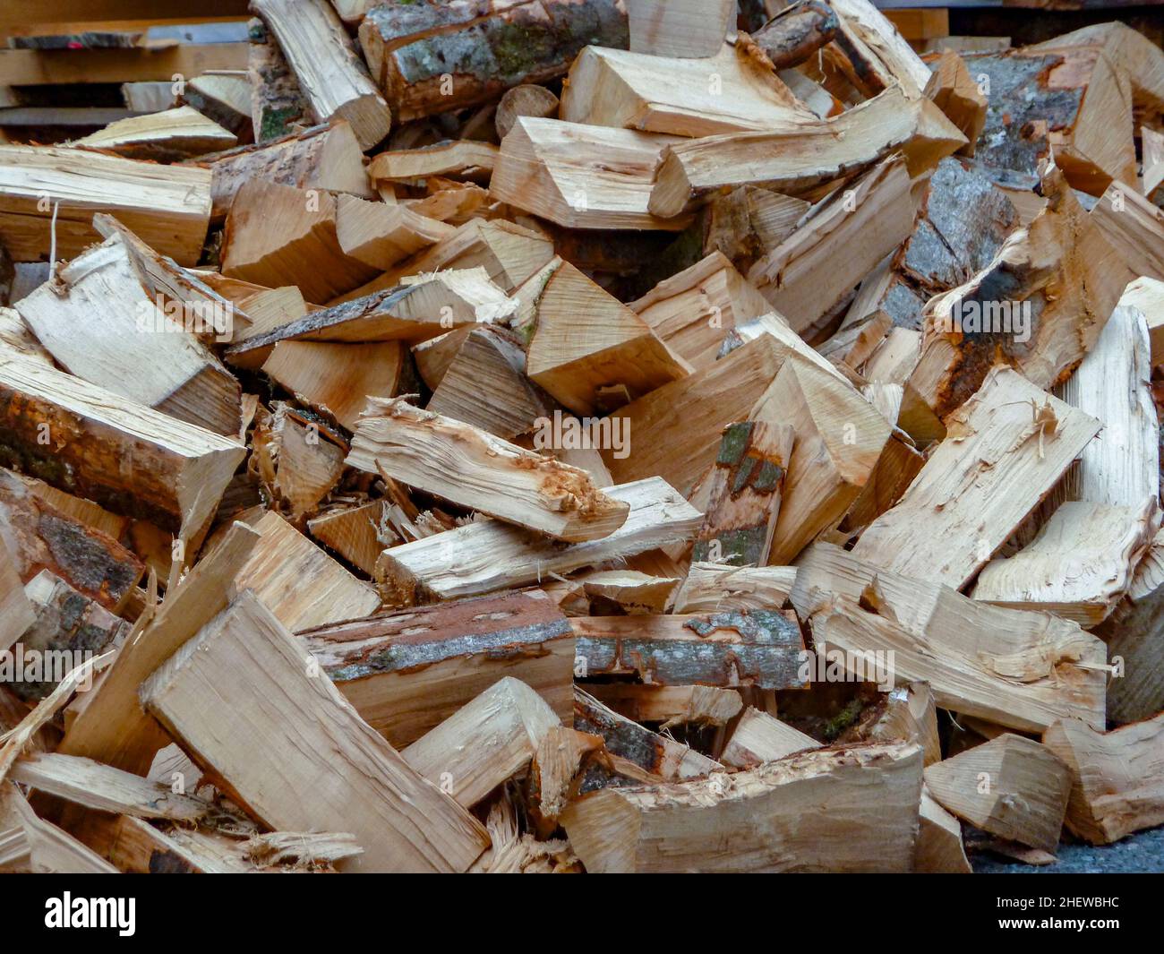 staple of new fresh cut fire wood Stock Photo - Alamy