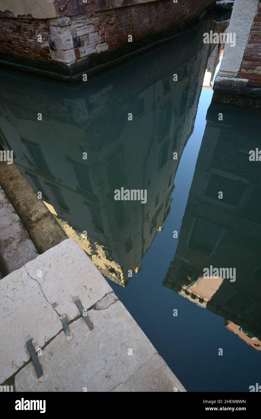 unusual urban glimpse of venice. residential buildings with partially ...