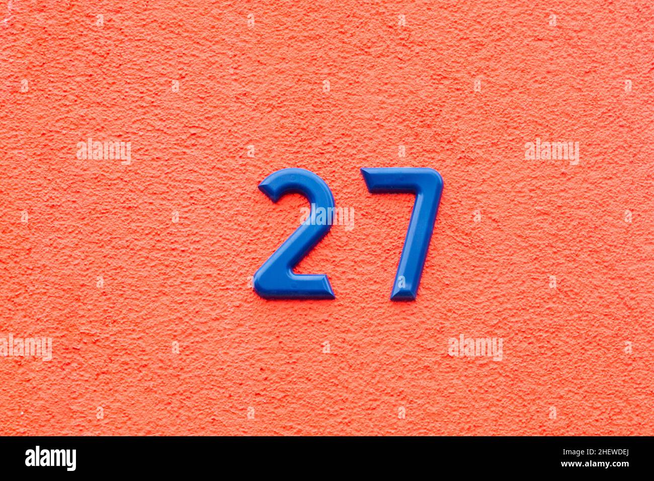 house number 27 at the wall for postal adress Stock Photo - Alamy