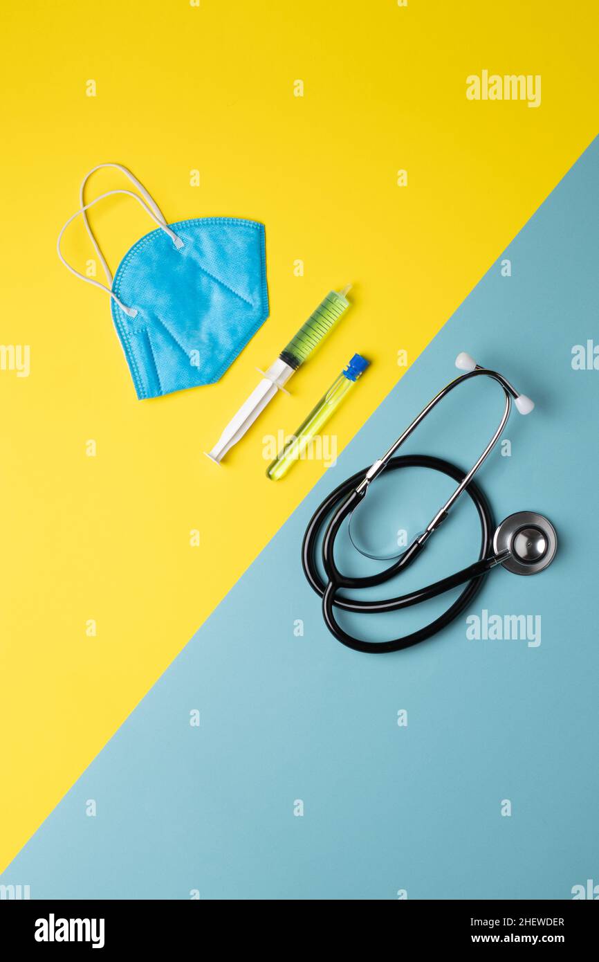 four elements of medical material placed aligned on a two-color ...
