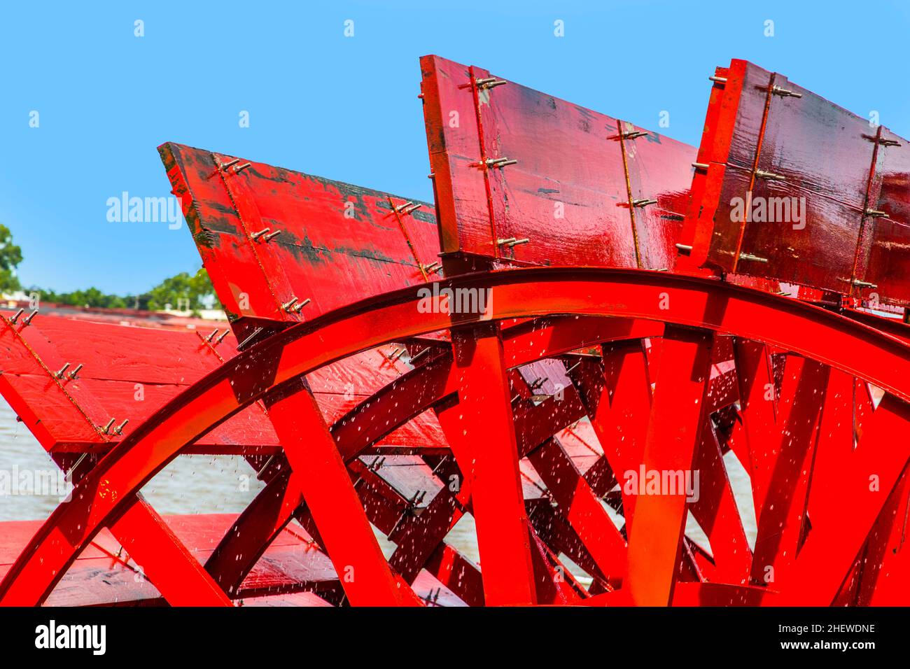 Red Riverboat Paddle Wheel in a River with Trees Stock Photo - Alamy