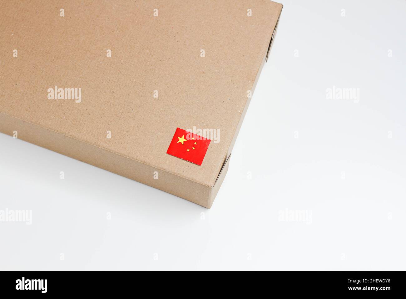 Post from China. Receiving a parcel. Box with the Chinese flag ...