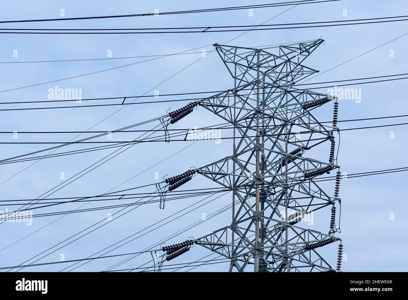 A massive and tall metal frame for electrical tower distribute the ...
