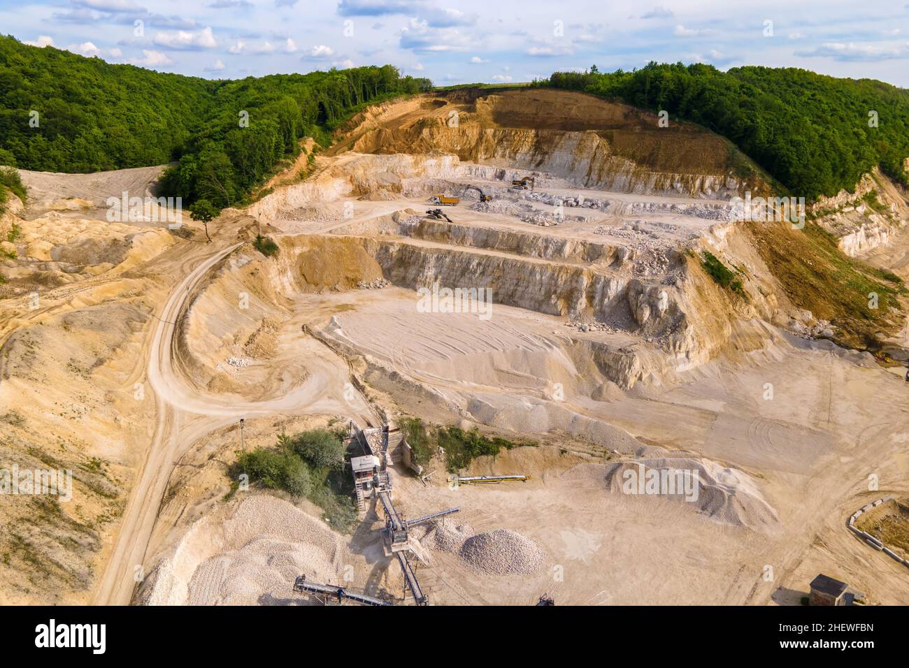 Open pit mining of construction sand stone materials with excavators ...