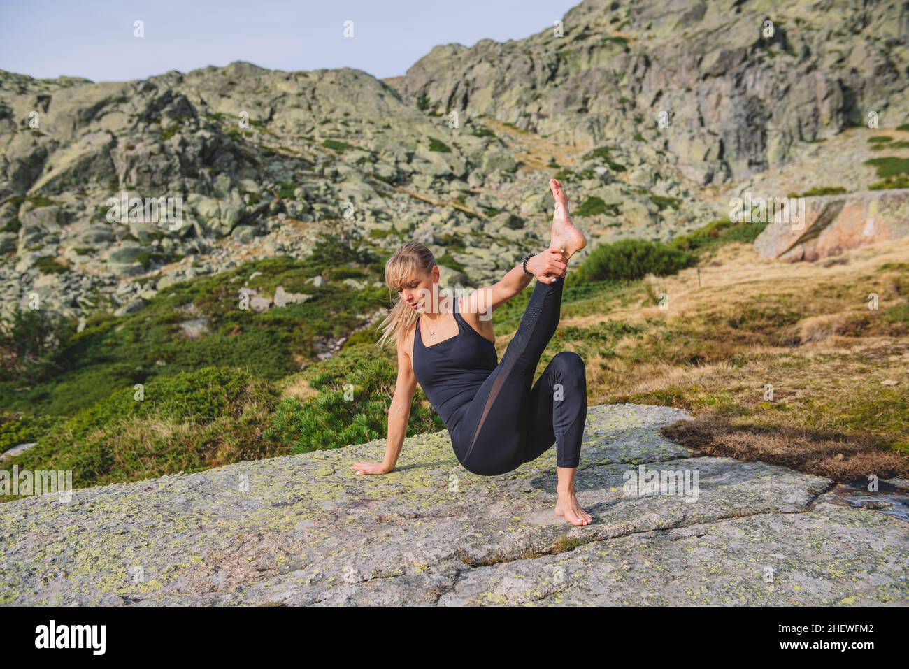 yoga poses woman mountain Stock Photo - Alamy