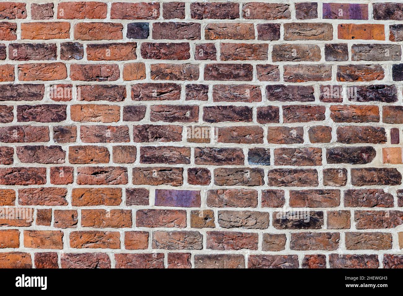 old historic brick wall in red Stock Photo - Alamy