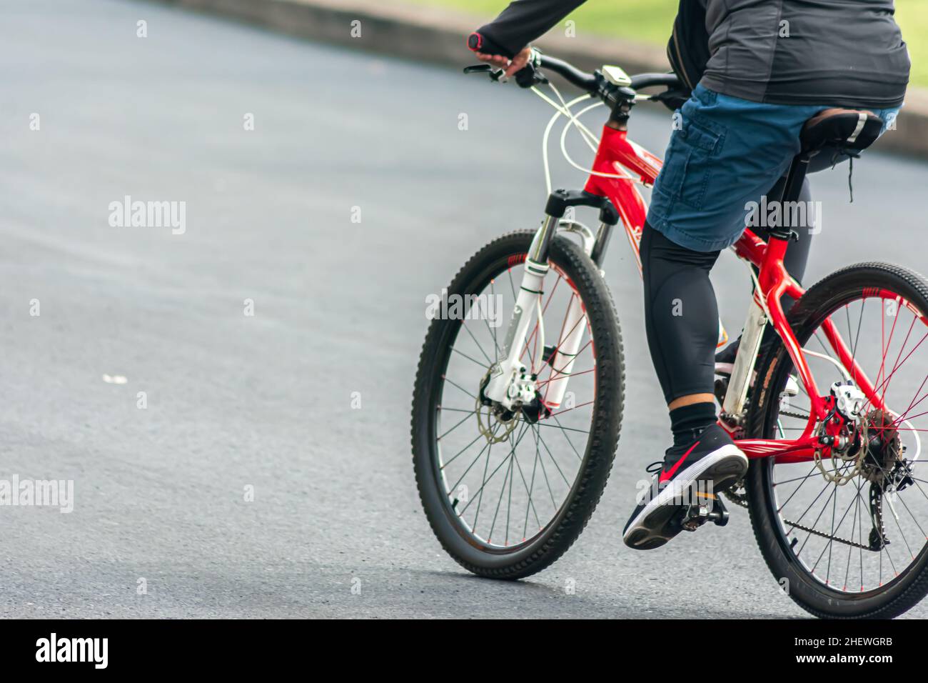 Legs man riding exercise bike hi-res stock photography and images - Alamy