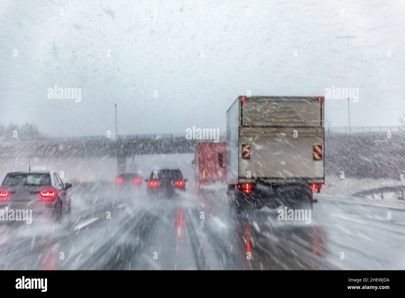 highway with cars in winter with snow fall in Germany Stock Photo - Alamy
