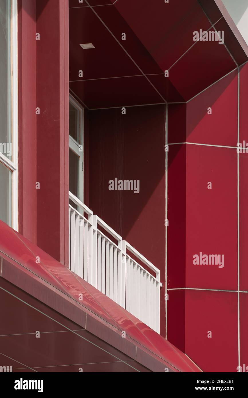 Modern red balcony of the building architecture with white aluminium ...