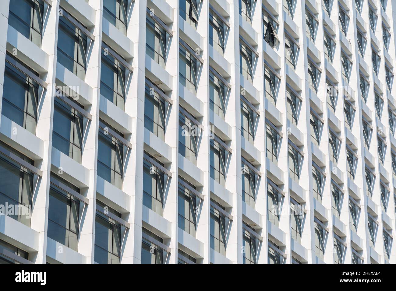 Windows of white building background Stock Photo - Alamy