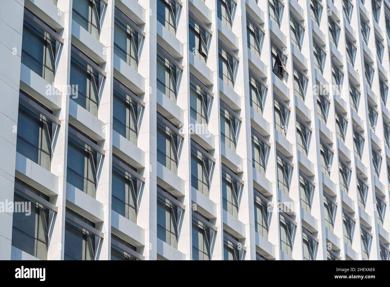 Windows of white building background Stock Photo - Alamy