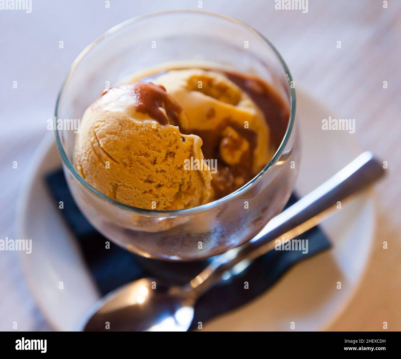 Tasty cold chocolate ice cream served with hot chocolate cream Stock ...