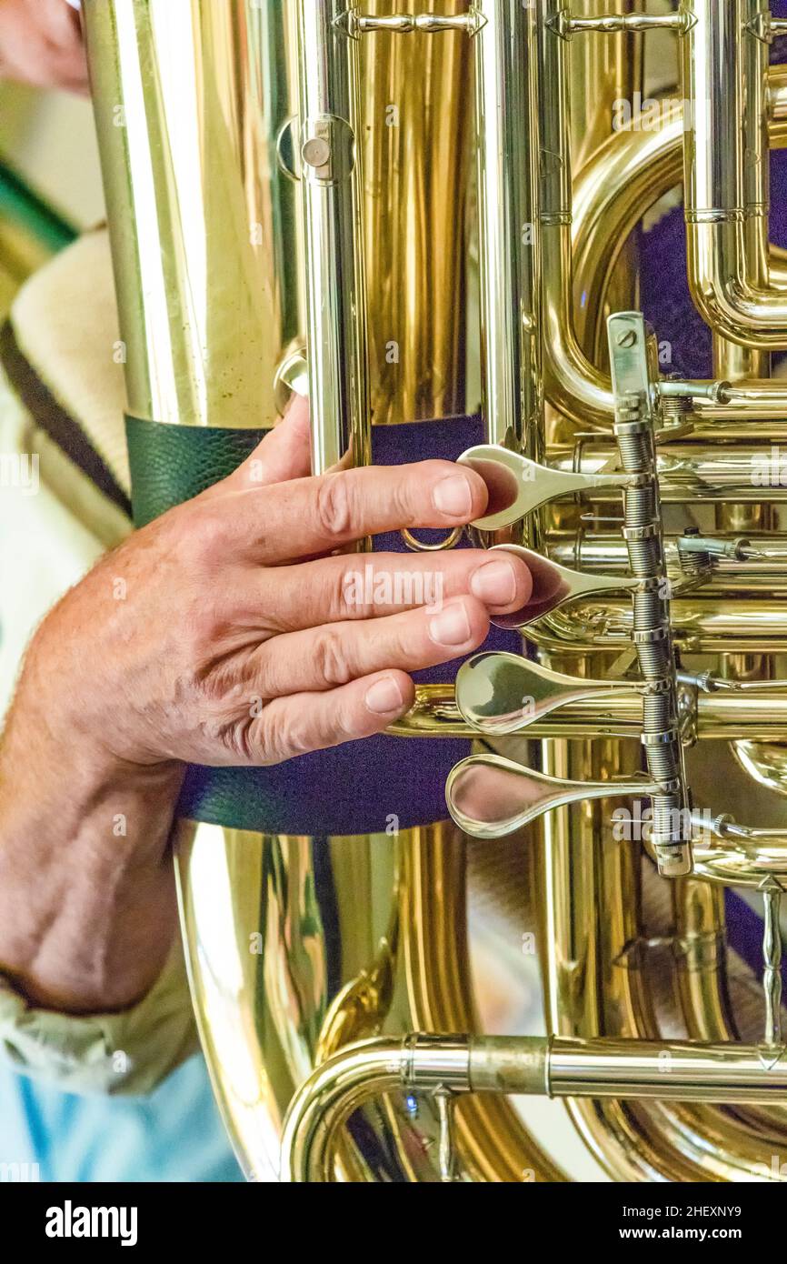 detail of finger of tuba player Stock Photo - Alamy