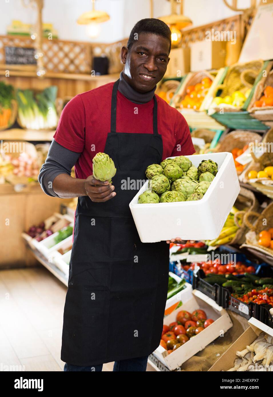 Portrait confident salesman demonstrating hi-res stock photography and ...