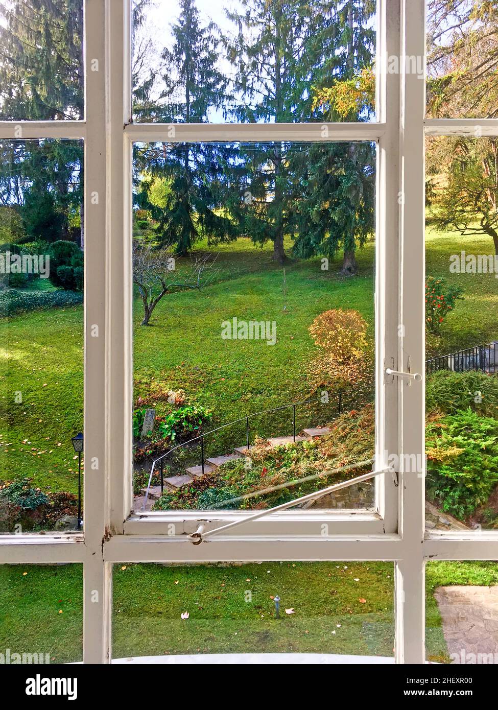 beautiful garden seen through old wooden window in vienna Stock Photo ...