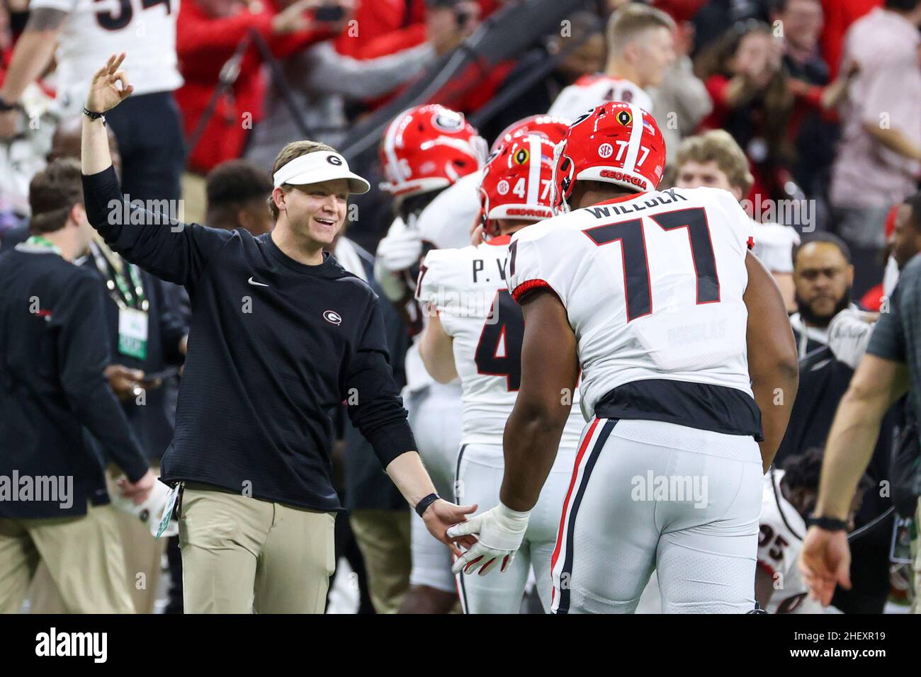 January 10, 2022: Georgia Bulldogs assistant coach congratulates the ...