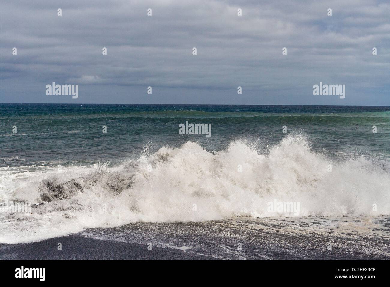 heavy waves with white wave crest in storm at the beach Stock Photo - Alamy