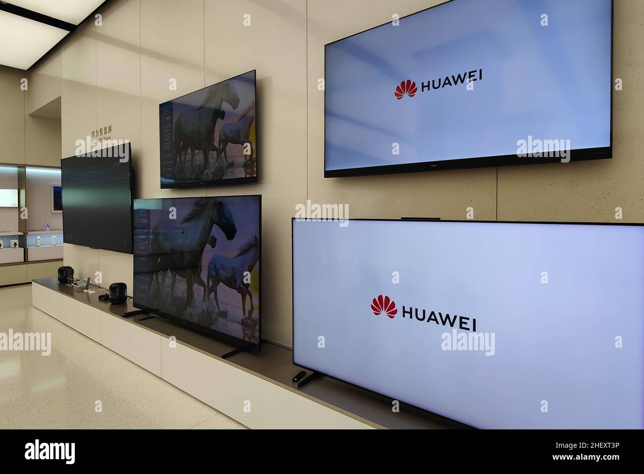 SHANGHAI, CHINA - JANUARY 12, 2022 - Customers stop to look at huawei ...