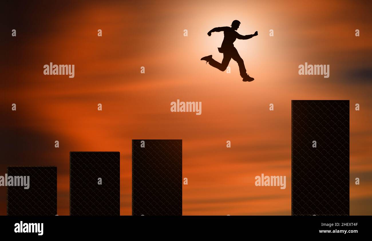 Business Man Jumps to the Higher Stair On Graph in front of Sunset Sky ...