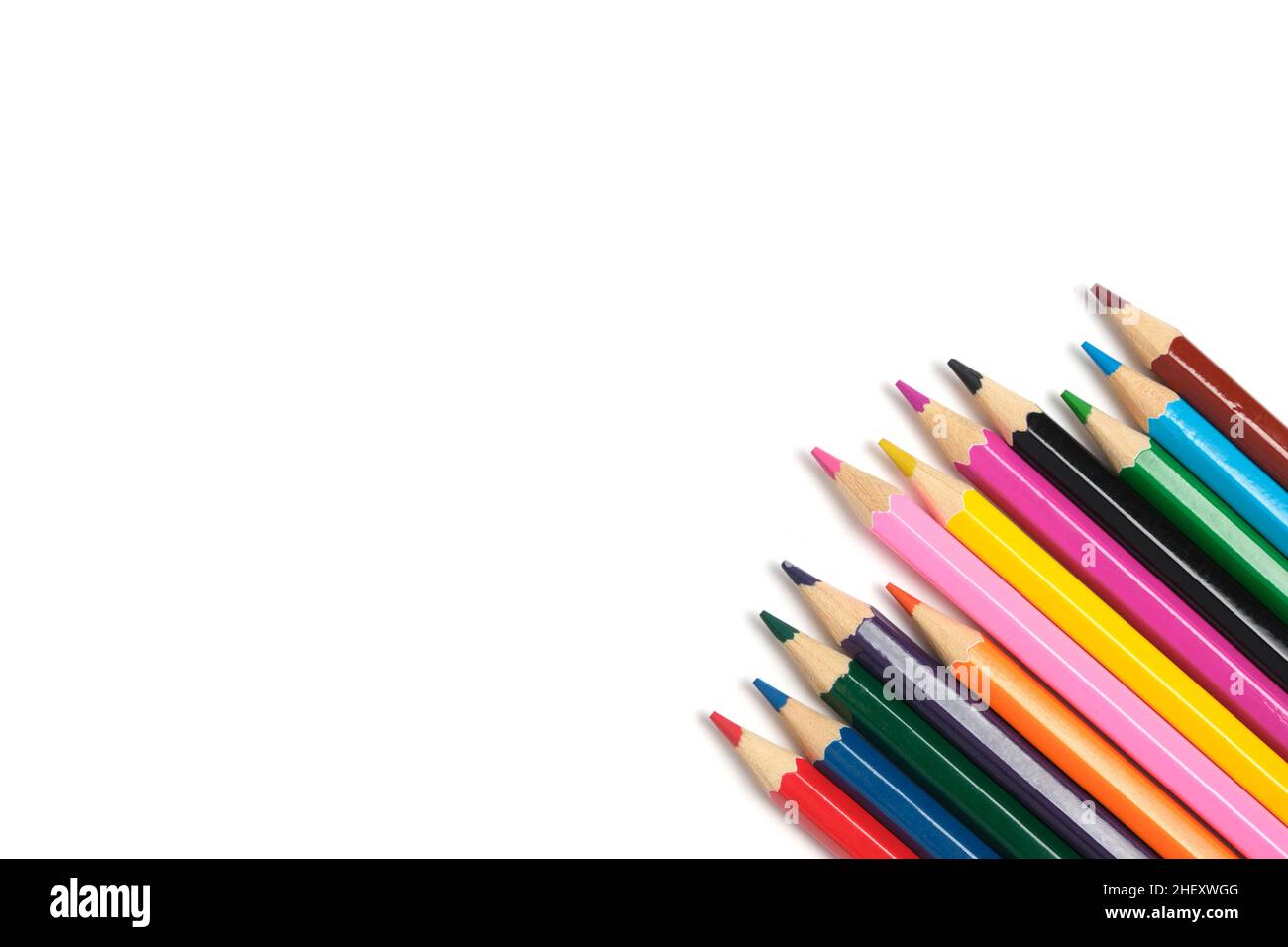 Bright colored pencils on a white background.School supplies for ...