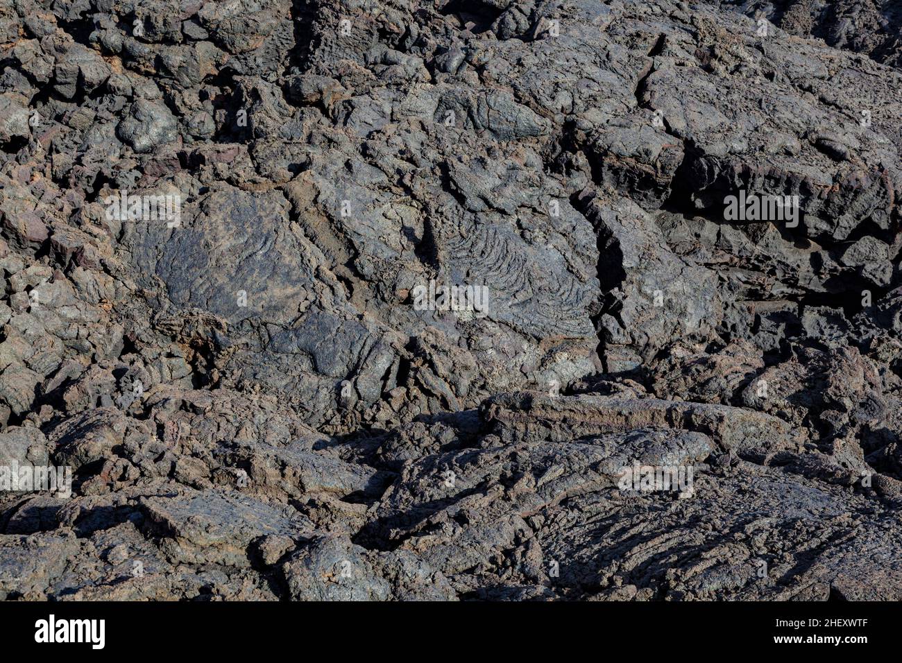 Stones of volcanic flow give a beautiful natural structure Stock Photo ...