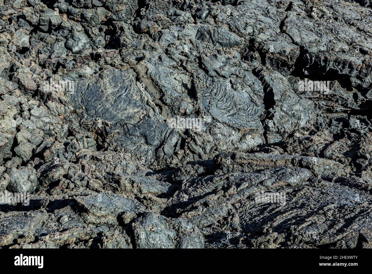 Stones of volcanic flow give a beautiful natural structure Stock Photo ...