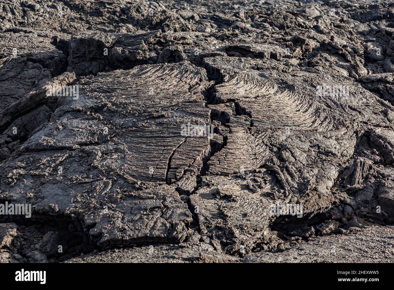 Stones of volcanic flow give a beautiful natural structure Stock Photo ...