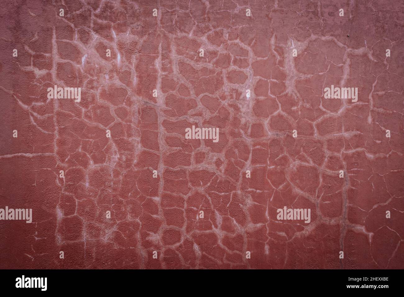 Red wall with rough texture for industrial background or wallpaper ...