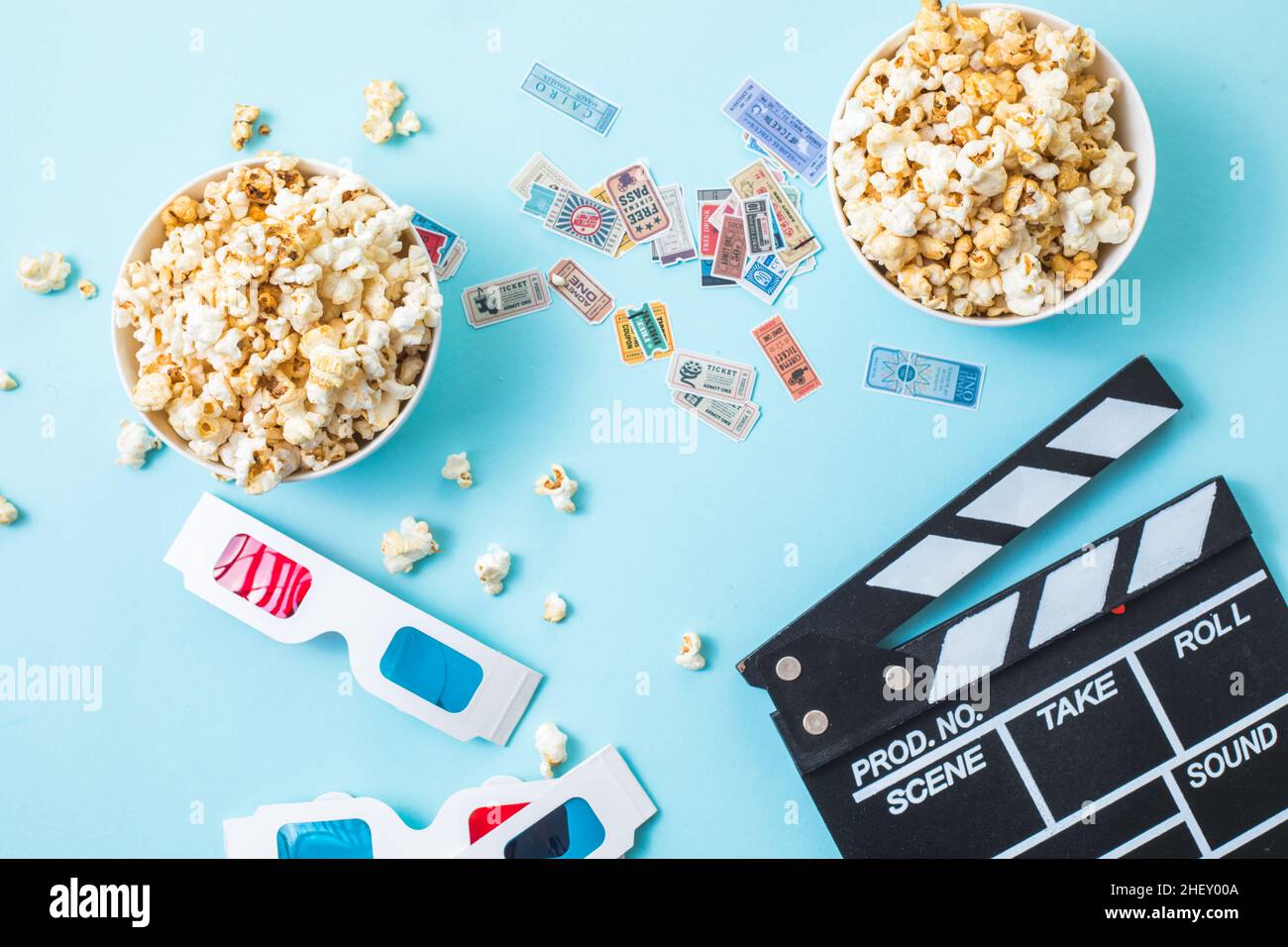 Cinema minimal concept. word movie, popcorn, clapperboard, 3D glasses ...
