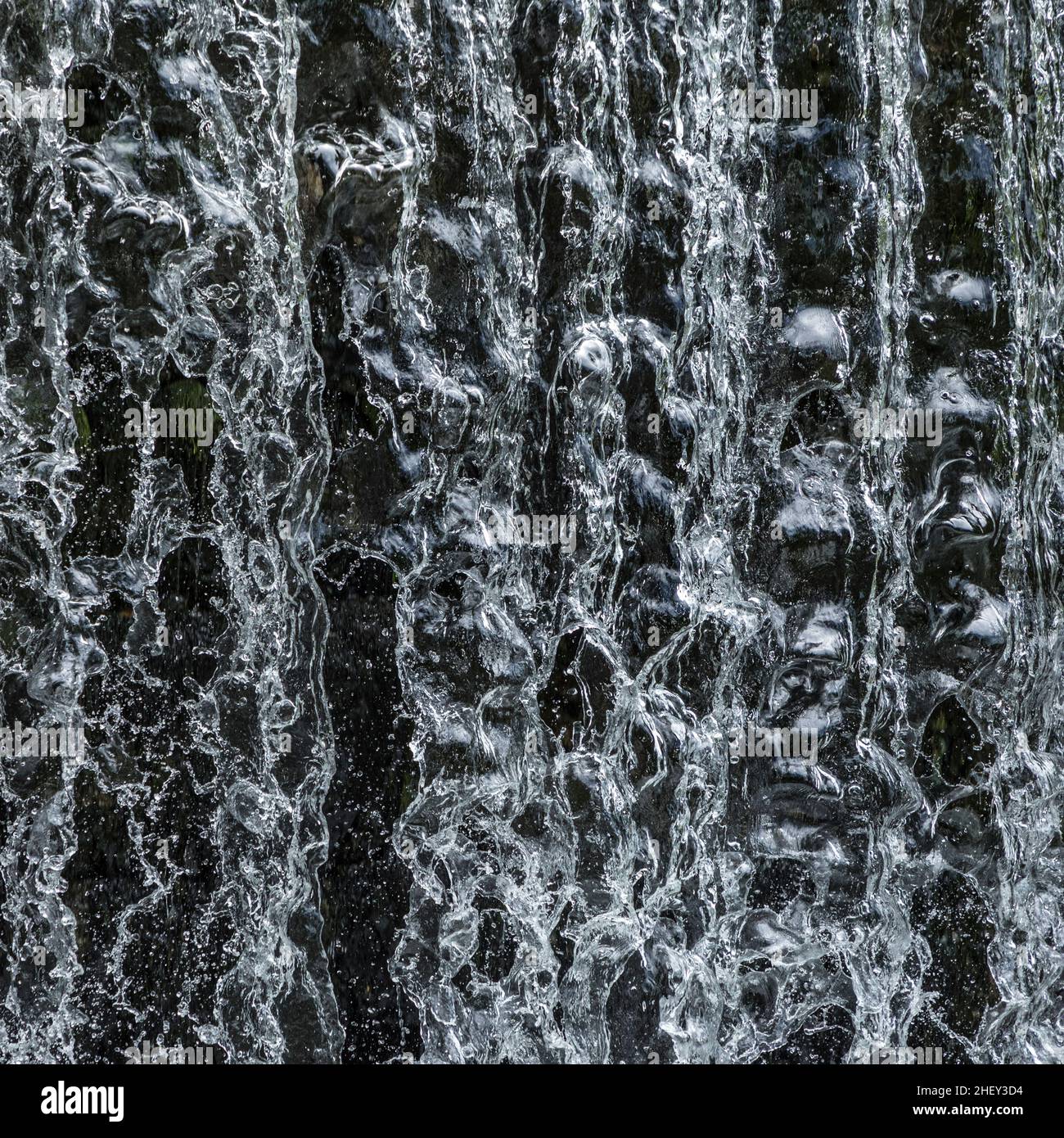 pattern of flowing water at a waterfall gives a harmonic background ...