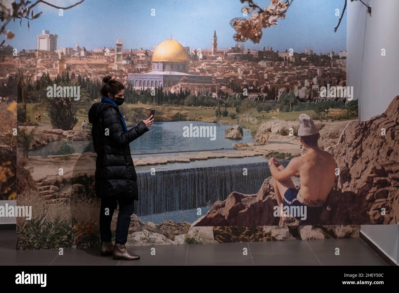 A visitor takes photo with cellular phone of three dimensional ...