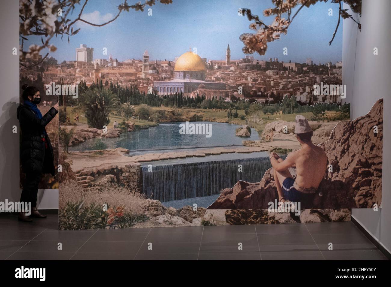 A visitor takes photo with cellular phone of three dimensional ...