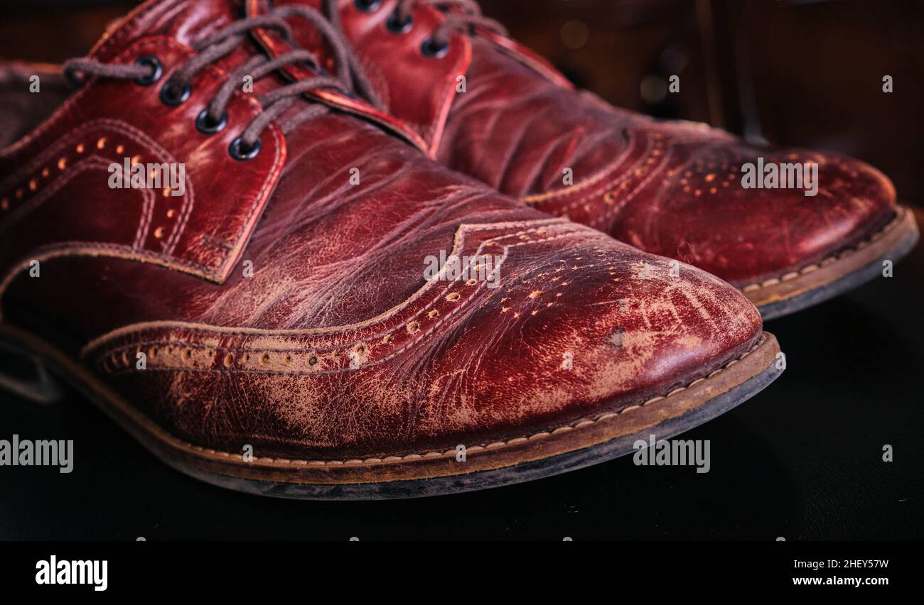 worn old leather scratches and scuffs on men oxford shoes Stock Photo ...