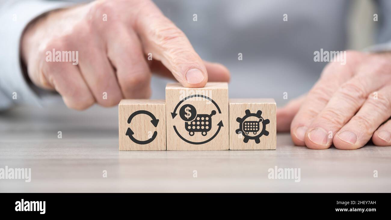 Wooden blocks with symbol of purchase concept Stock Photo - Alamy