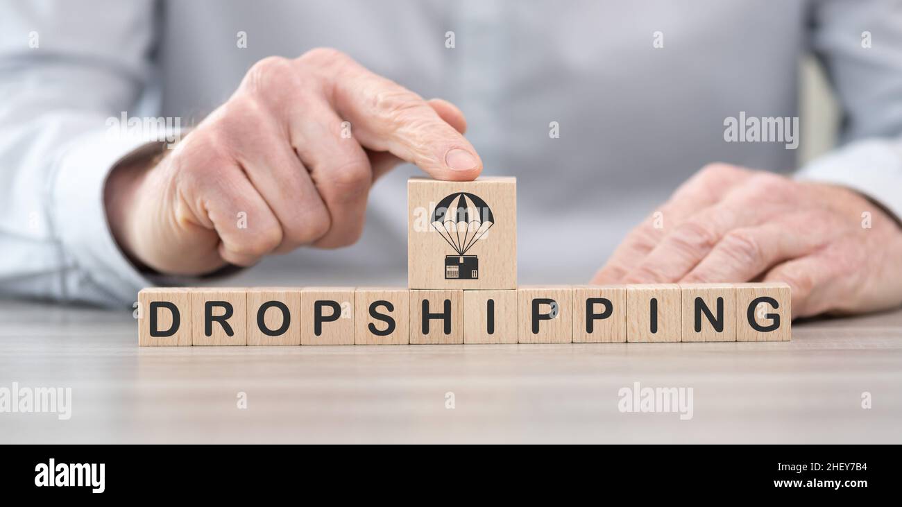 Wooden blocks with symbol of dropshipping concept Stock Photo - Alamy