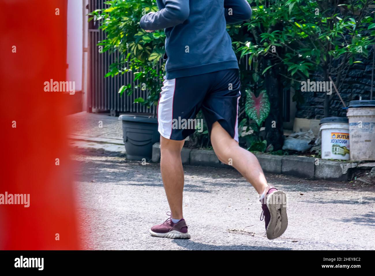 Athletic man running hi-res stock photography and images - Alamy