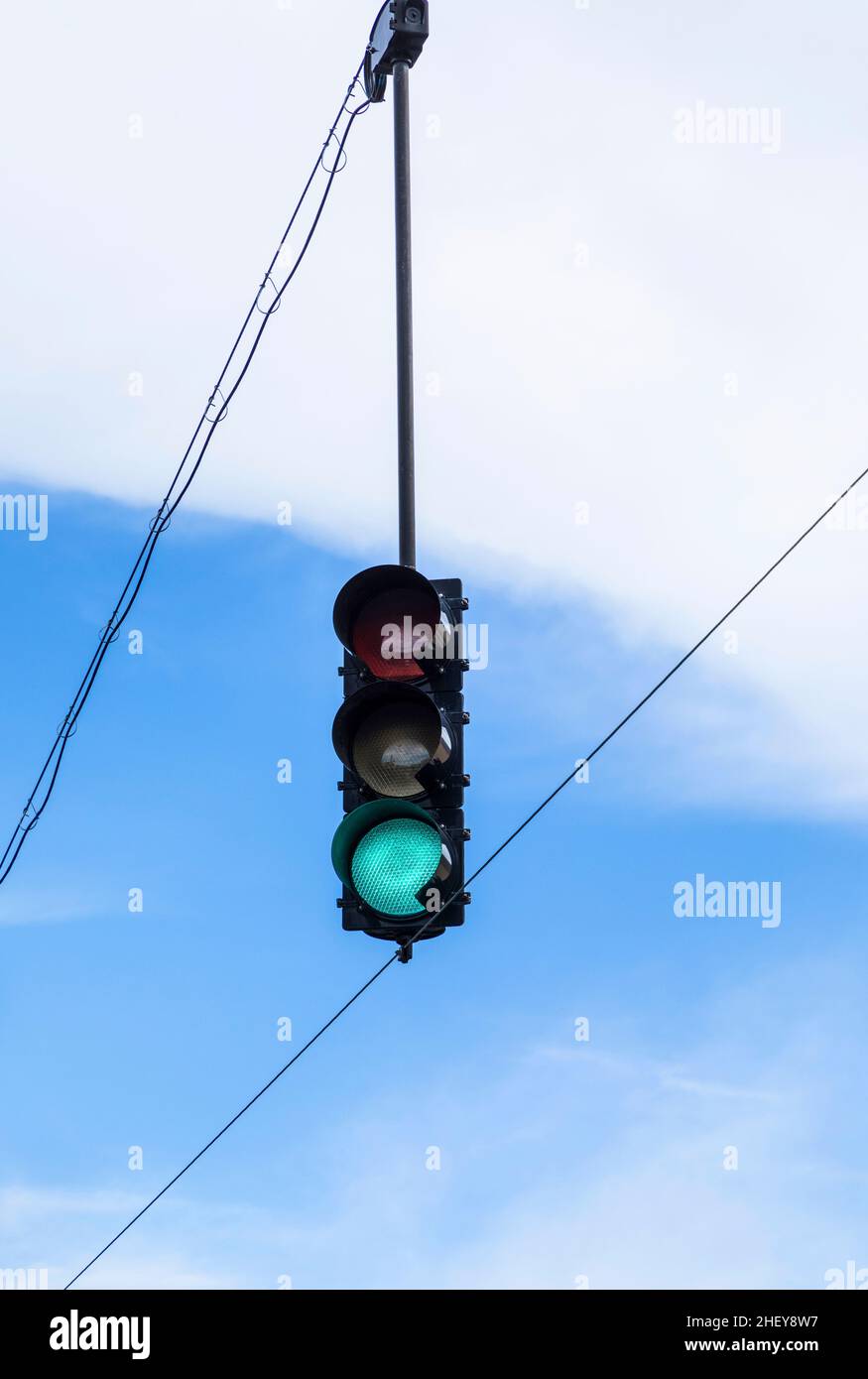 overhead traffic light under blue sky Stock Photo - Alamy